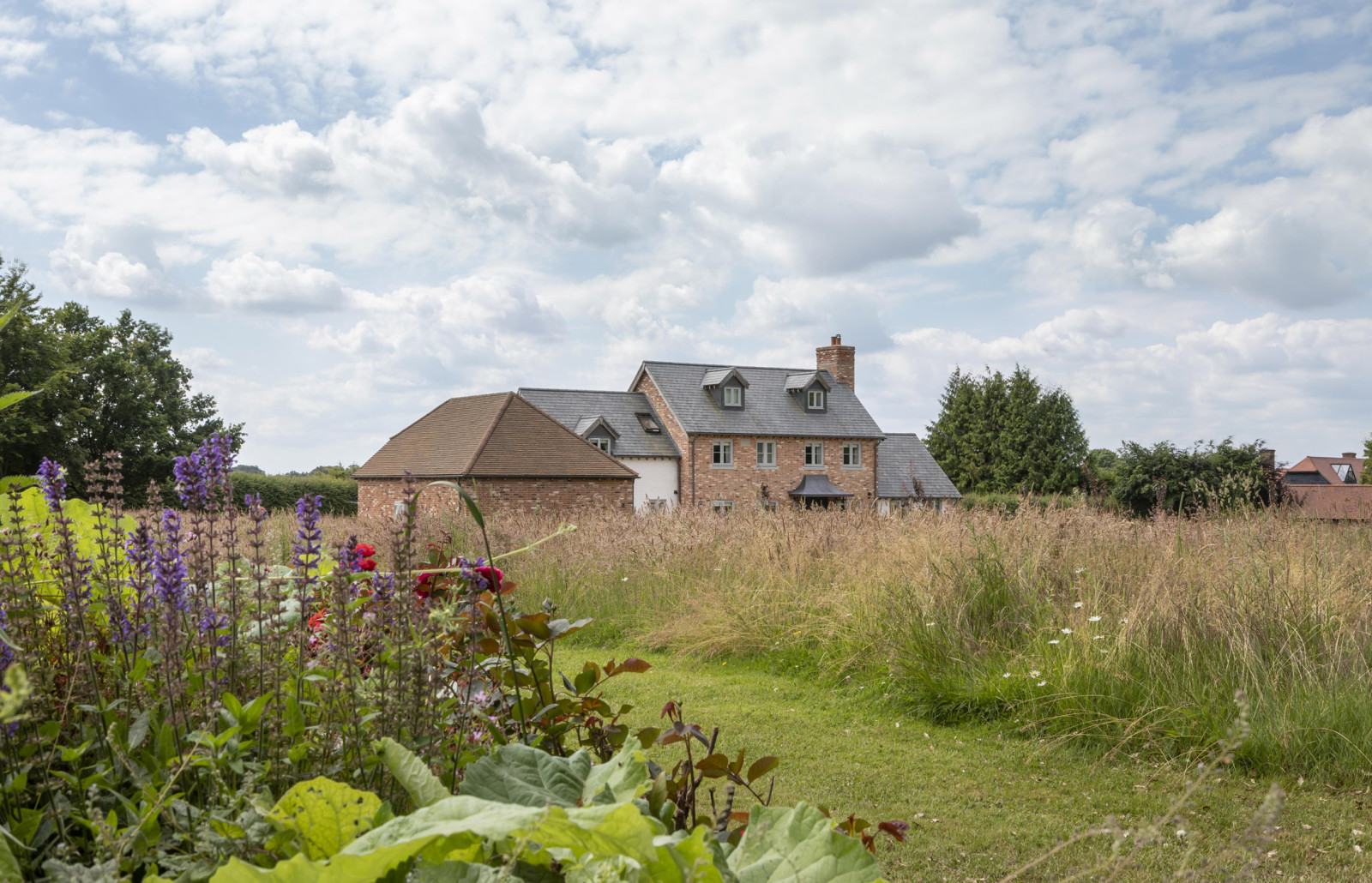 Traditional Replacement Farmhouse - Anderson Orr Architects Ltd.