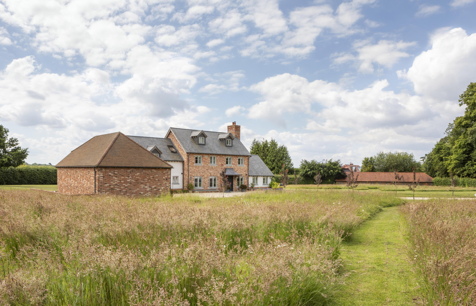 Traditional Replacement Farmhouse - Anderson Orr Architects Ltd.